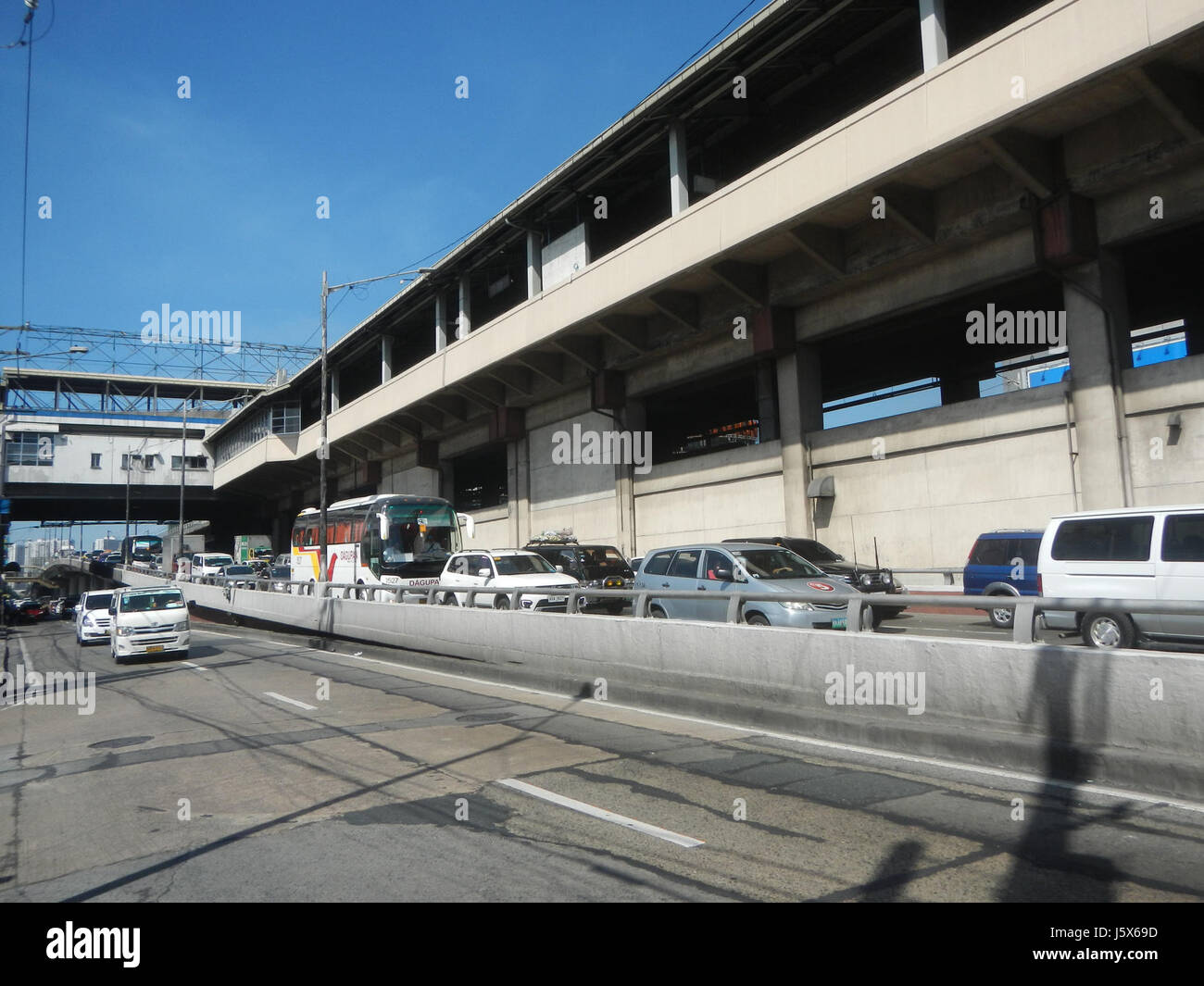 This image shows the Quezon Avenue MRT Station and its surrounding ...
