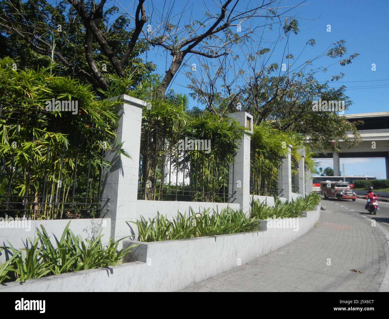 The Pasig River Park in Makati features the J.P. Rizal Extension Bridge ...