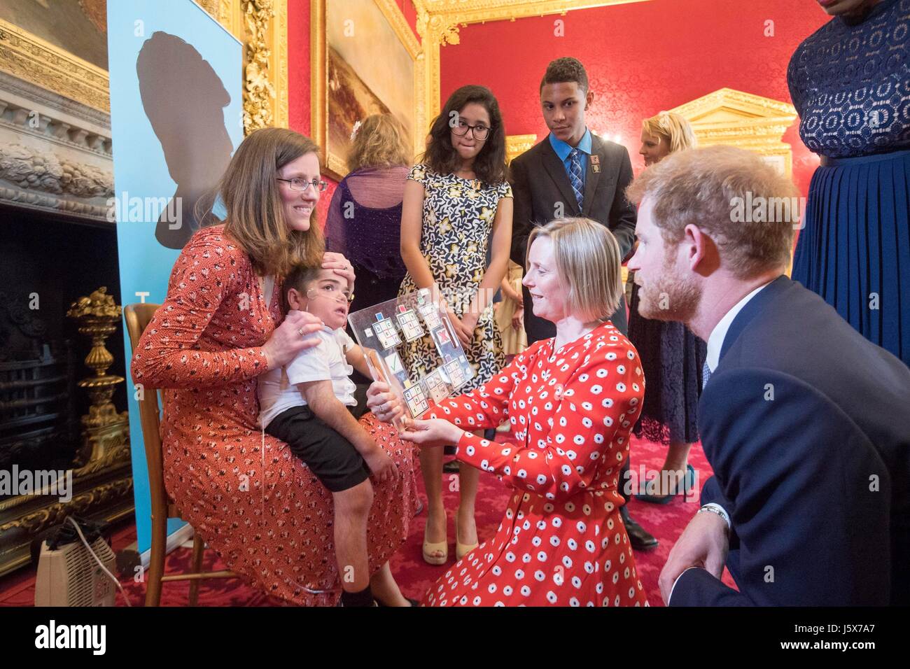 Prince Harry speaks to winner Jonathan Ryan at the Diana Award's ...