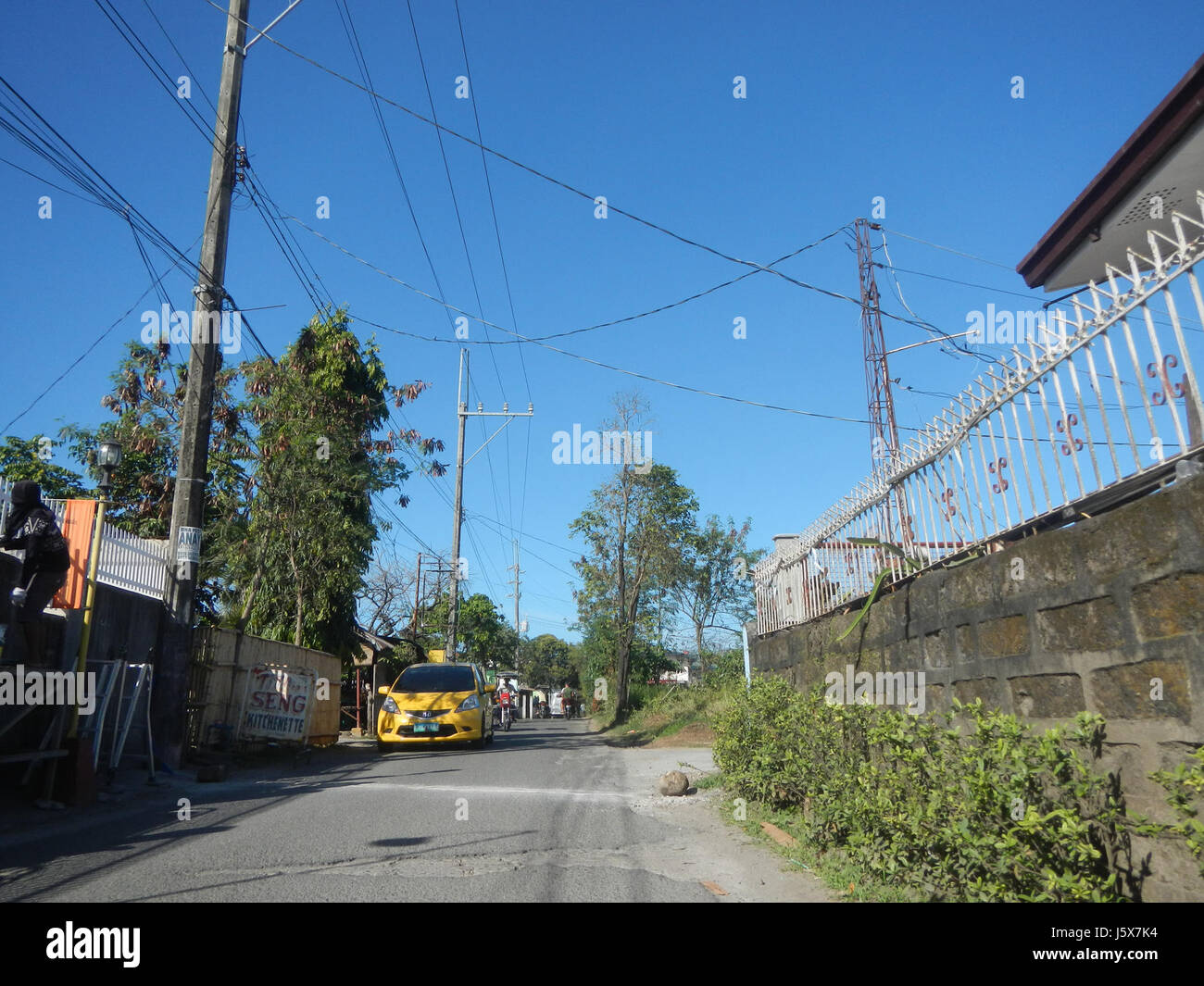 A street view of Prenza I in Marilao, Bulacan, showing the M. Villarica ...