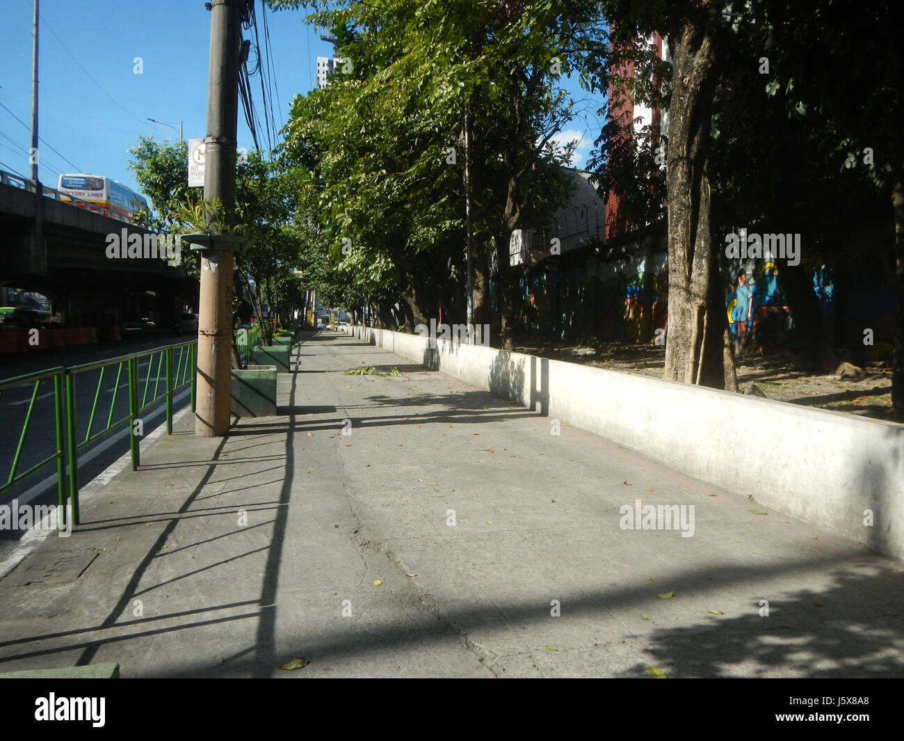 This image shows Bonny S. Serrano Avenue, the Santolan MRT Station, and ...