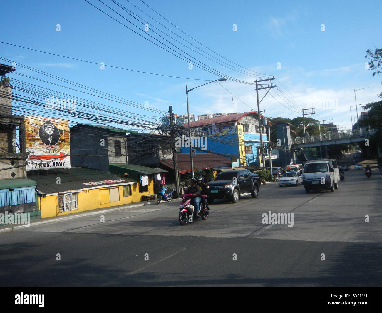 This image showcases Barangays Socorro and Bonny along Bonny Serrano ...