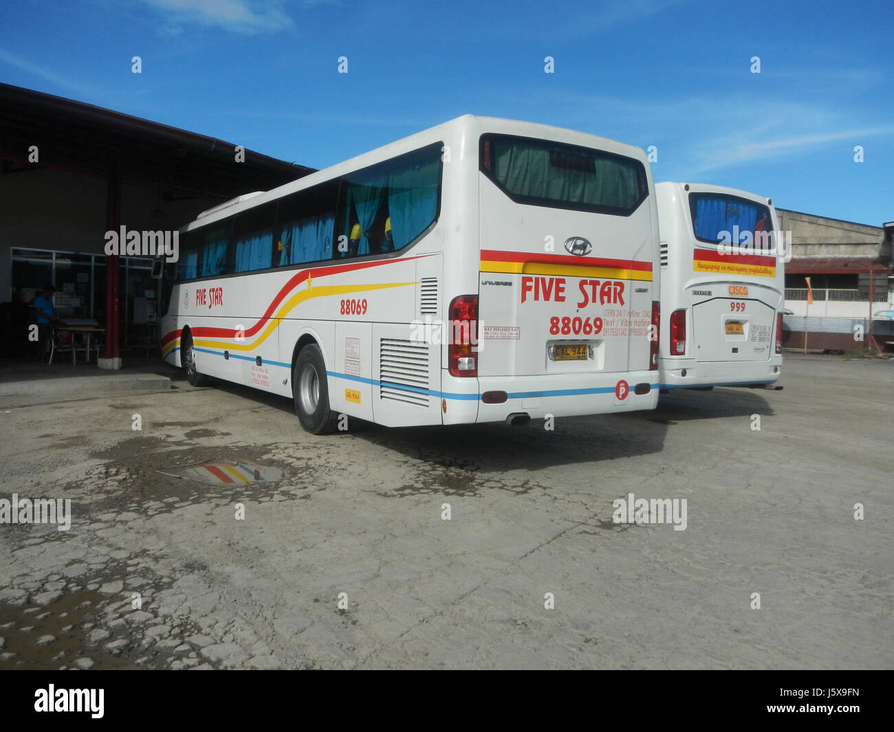 03100 Five Star and Cisco buses in bus stop San Miguel Bulacan 03 Stock ...