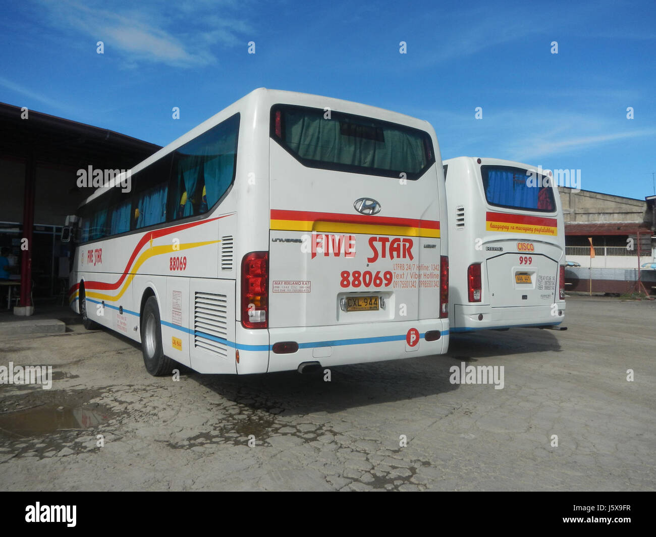 03100 Five Star and Cisco buses in bus stop San Miguel Bulacan 04 Stock ...
