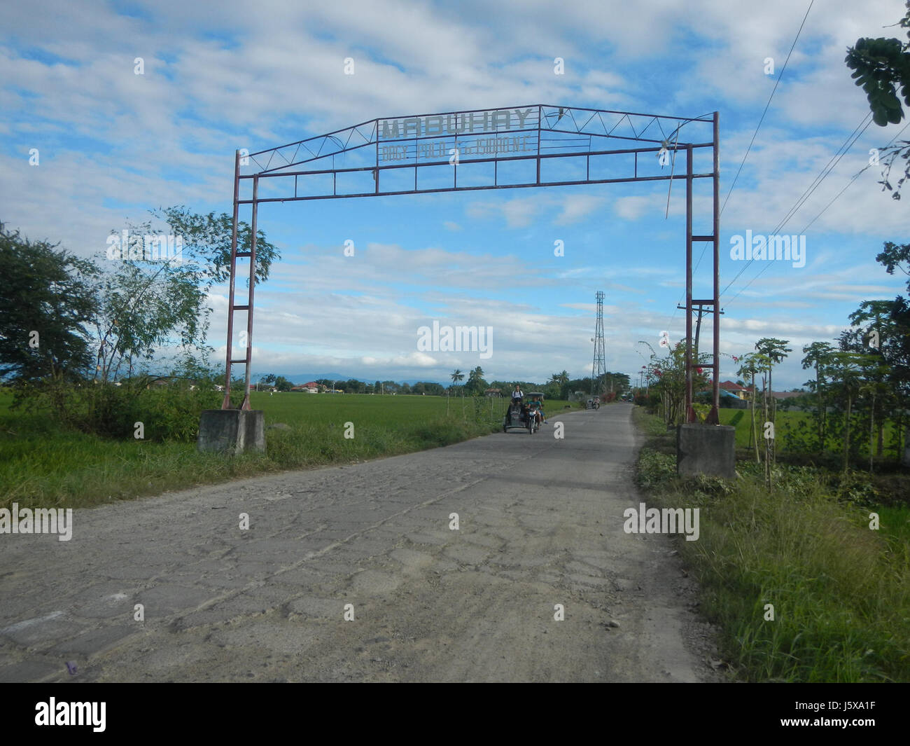 This image showcases the rural landscape of Pulo Tabon in San Isidro ...