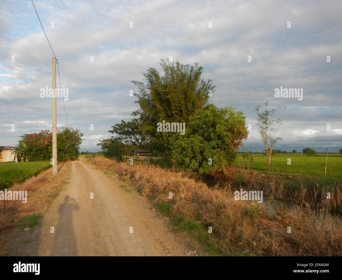This image depicts the rural landscape of Pulo and San Isidro in Nueva ...