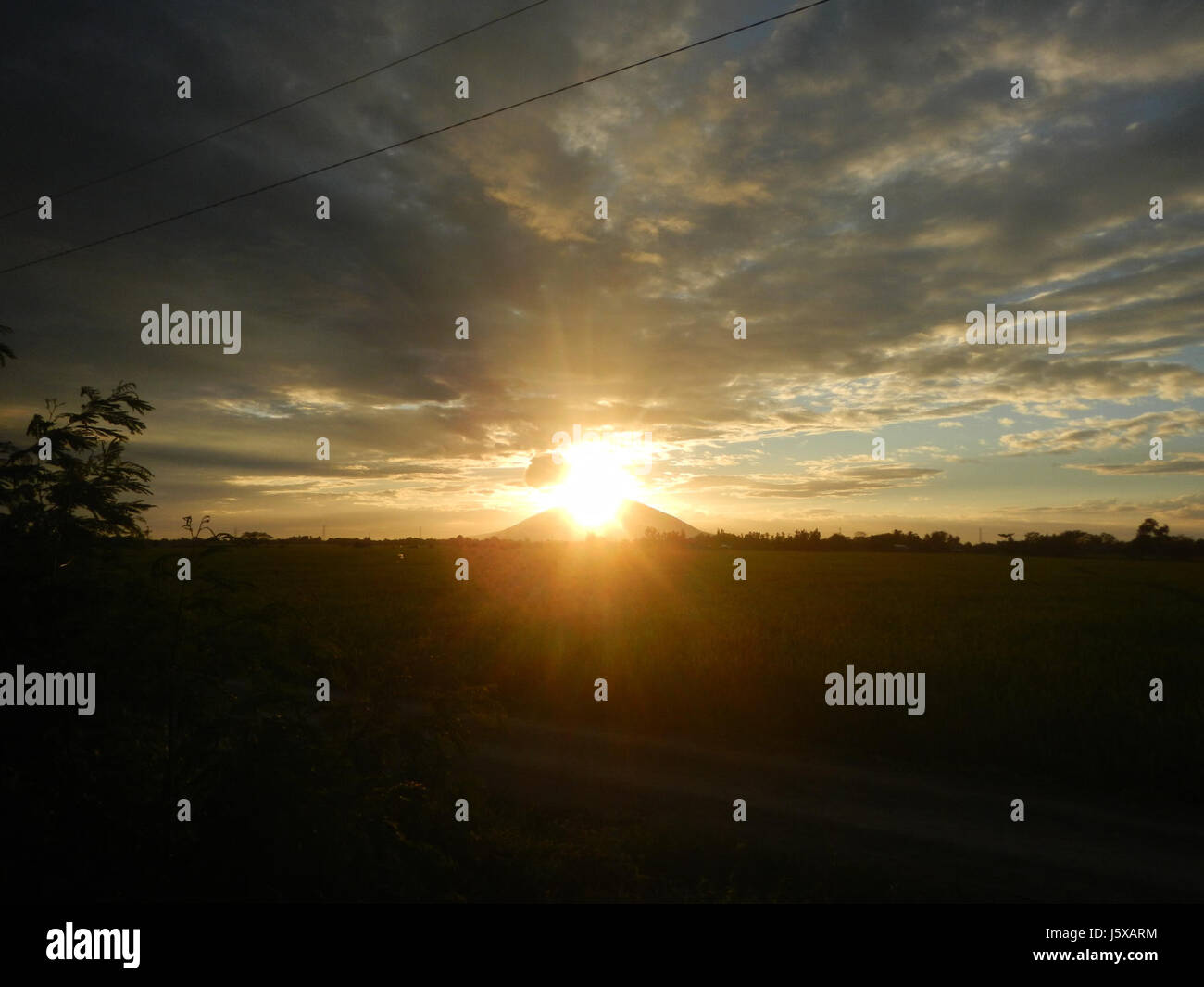 This image captures the stunning view of Mount Arayat, located in San ...