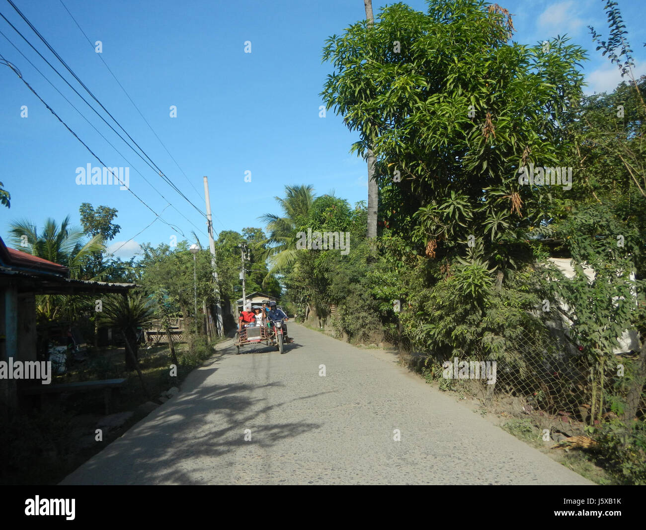 This image captures a road view of San Vicente, Batasan Bata, Matanda ...