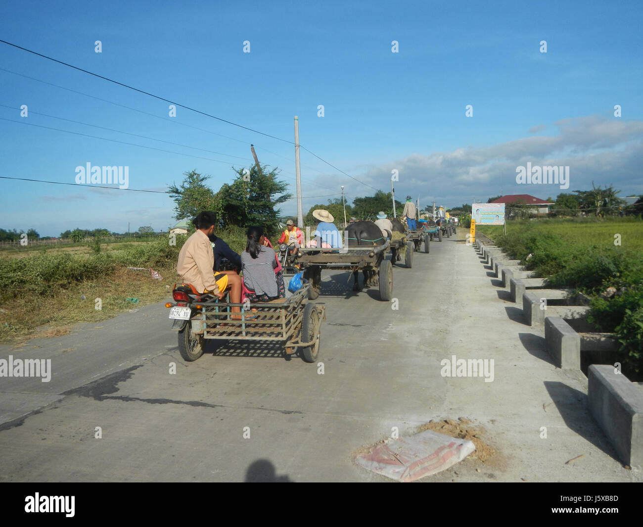 04542 Carabao drawn wooden carts caravan Magumbali, Candaba, Pampanga ...