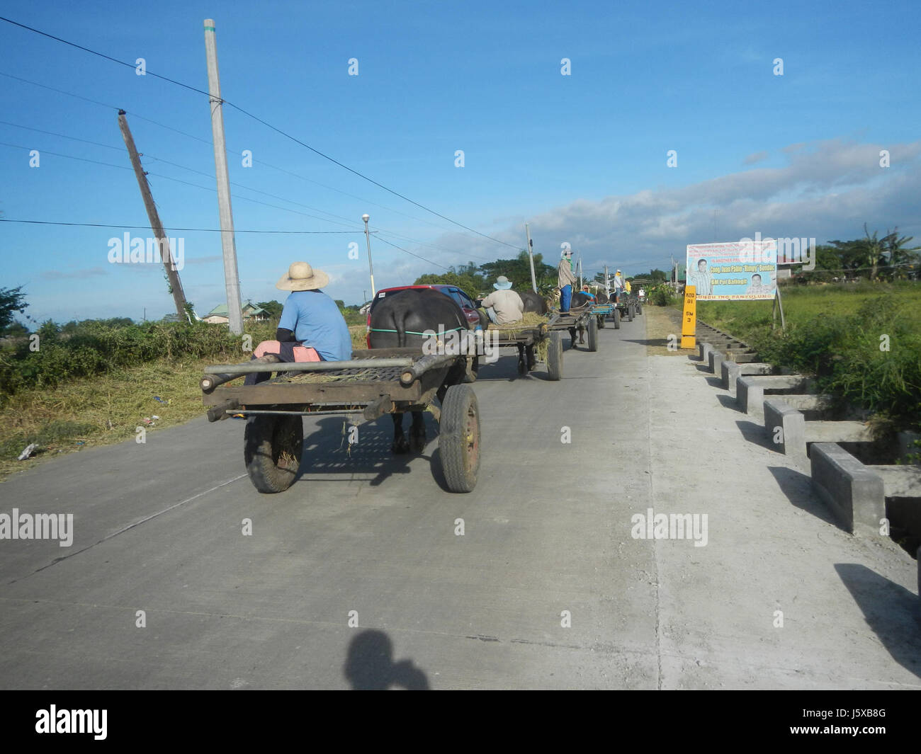 Carabao-drawn wooden carts, seen here in Magumbali, Candaba, Pampanga ...