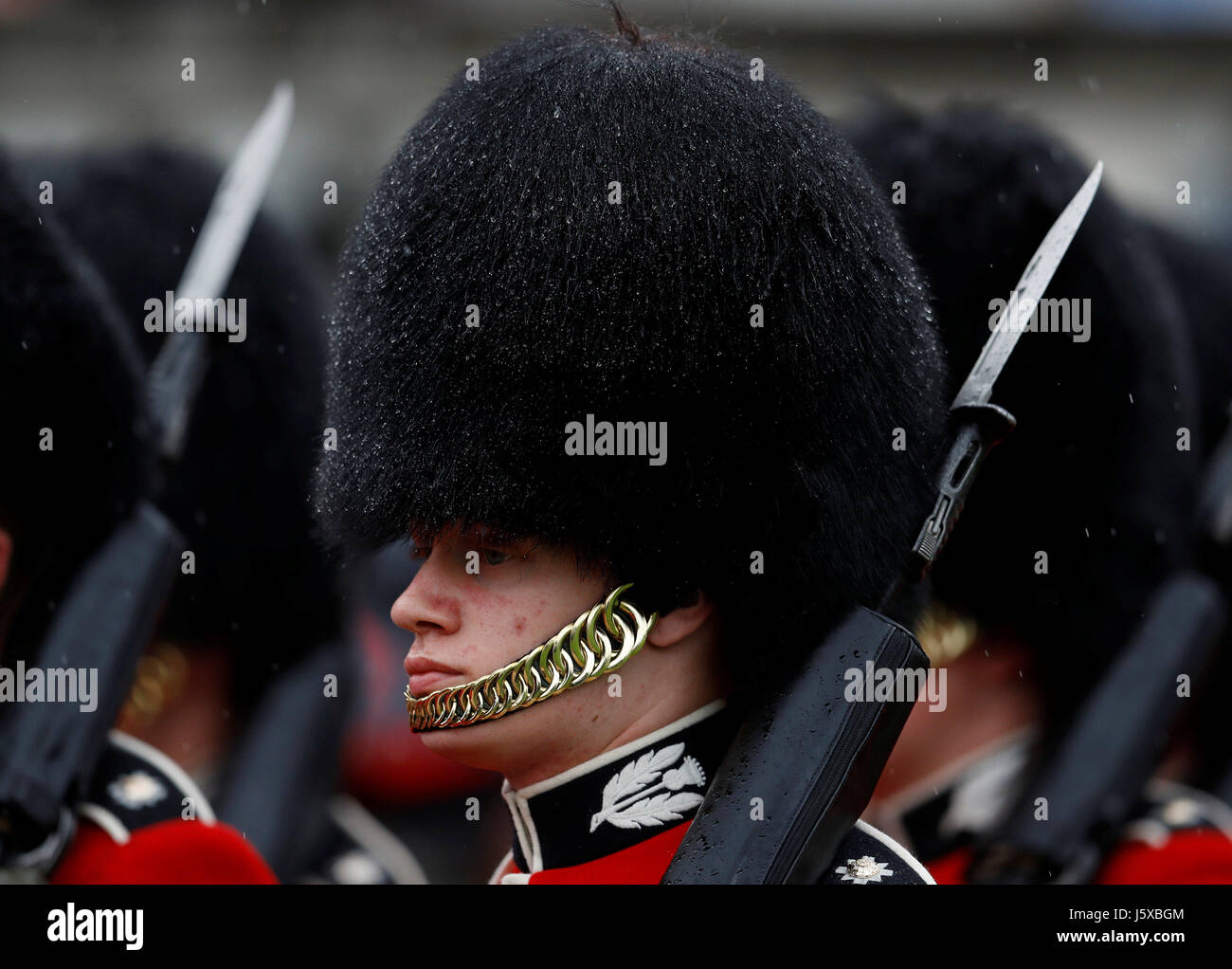 Soldiers of the Scots Guards after Queen Elizabeth II presented new ...