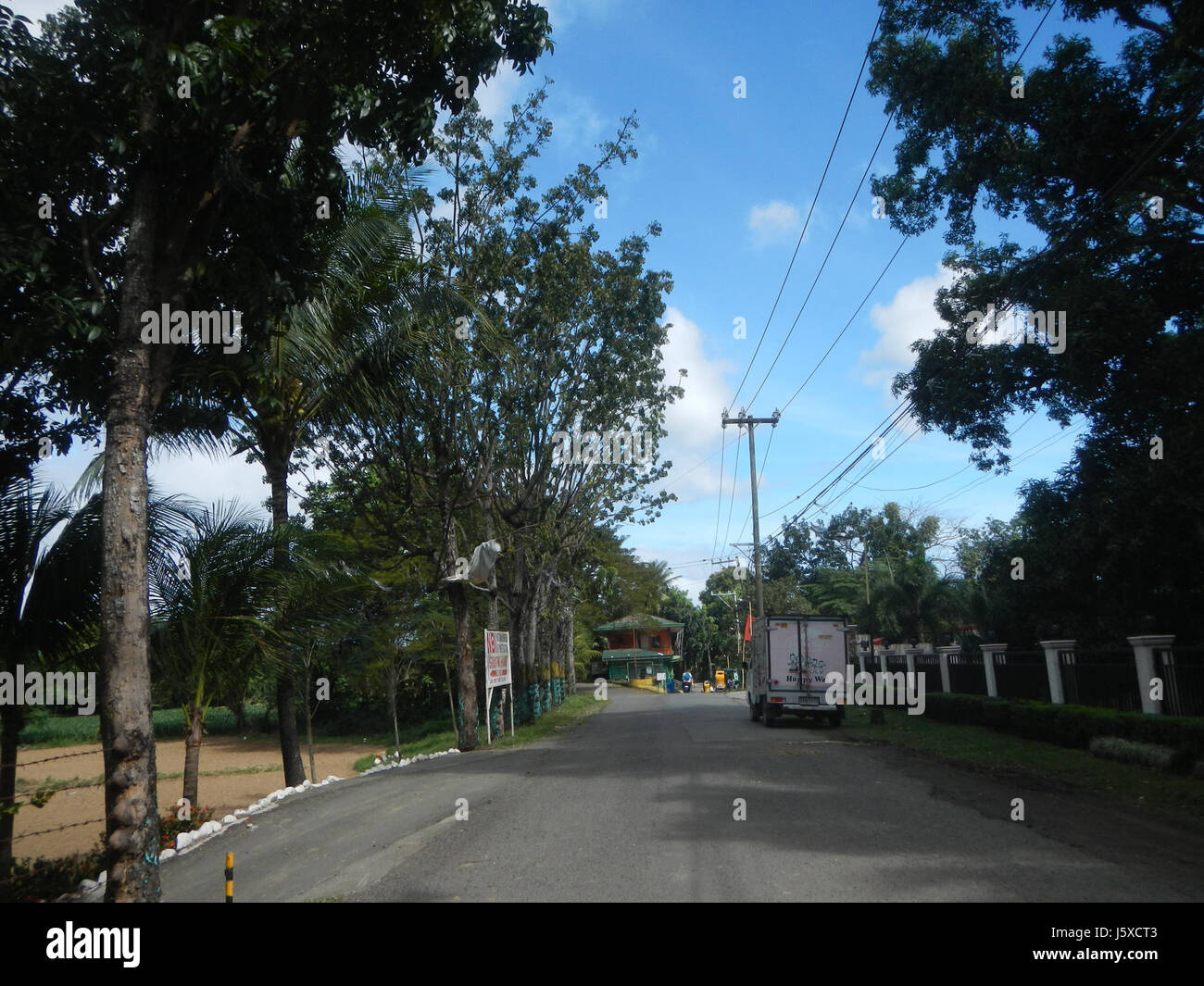 The Sipat-Dampol Farm-to-Market Road in Plaridel, Bulacan, serves as an ...