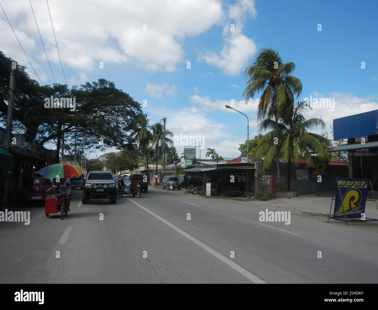 This road construction project in Pandi, Bulacan, Philippines, spans ...