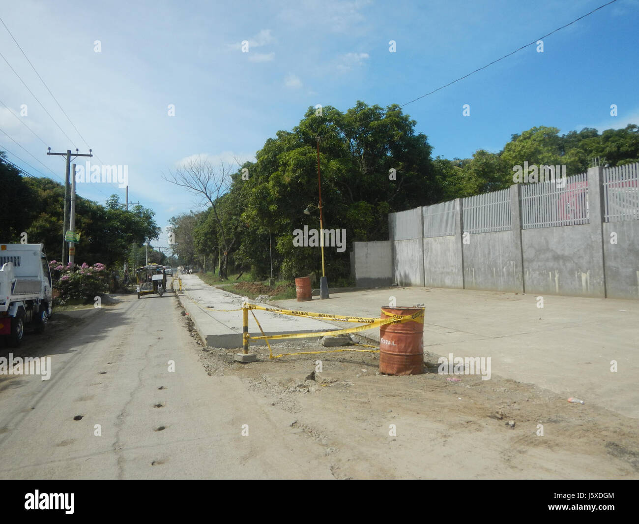 A photo showing the ongoing construction of a road connecting various ...