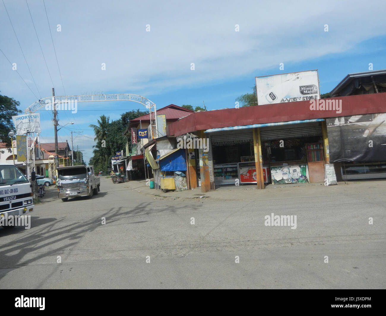 This image captures a street scene in Sitio Palanas, Bagong Barrio ...