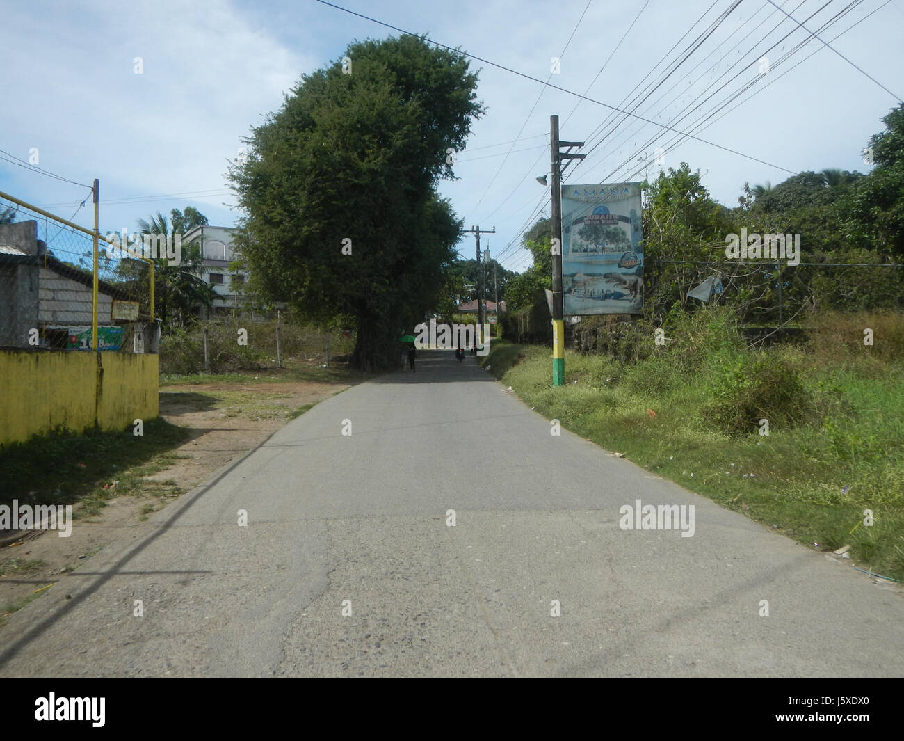 The road in Poblacion San Roque, Bagong Barrio, Pandi, Bulacan, is part ...
