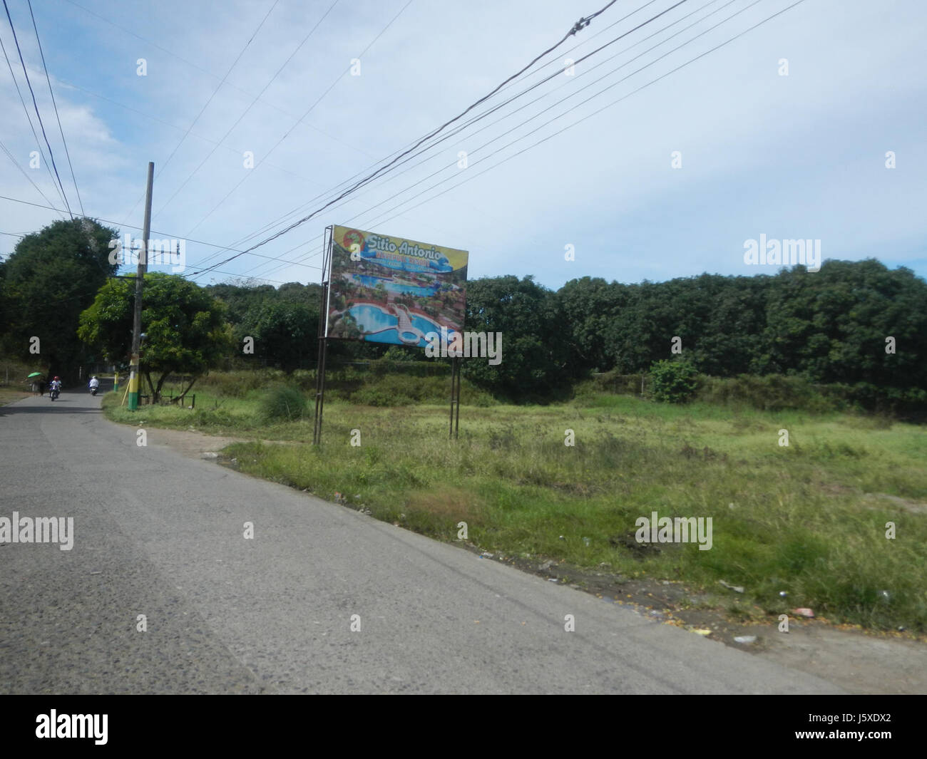 This road in Pandi, Bulacan, connects the Poblacion San Roque and ...