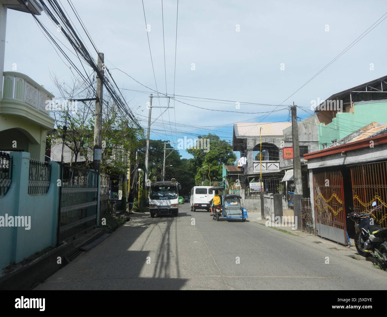 A photograph of the road in Poblacion San Roque, Bagong Barrio, Pandi ...