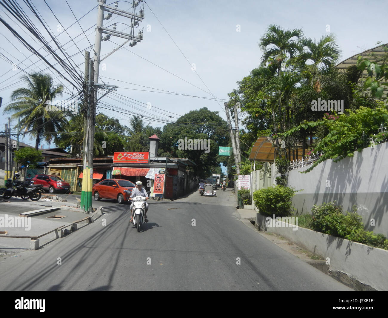 This image depicts a construction site along Pandi Bulacan Road 13 in ...