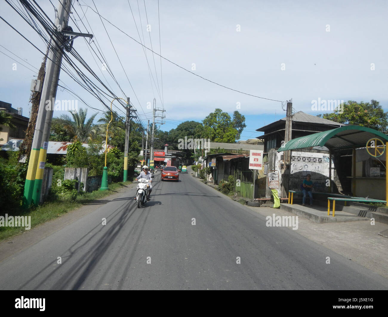 This image captures a road section in Pandi, Bulacan, focusing on the ...