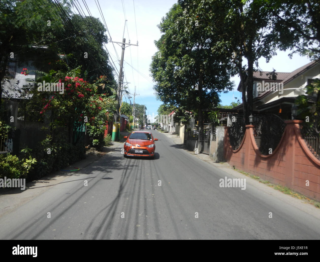 This image shows the road in Poblacion San Roque, Bagong Barrio, Pandi ...