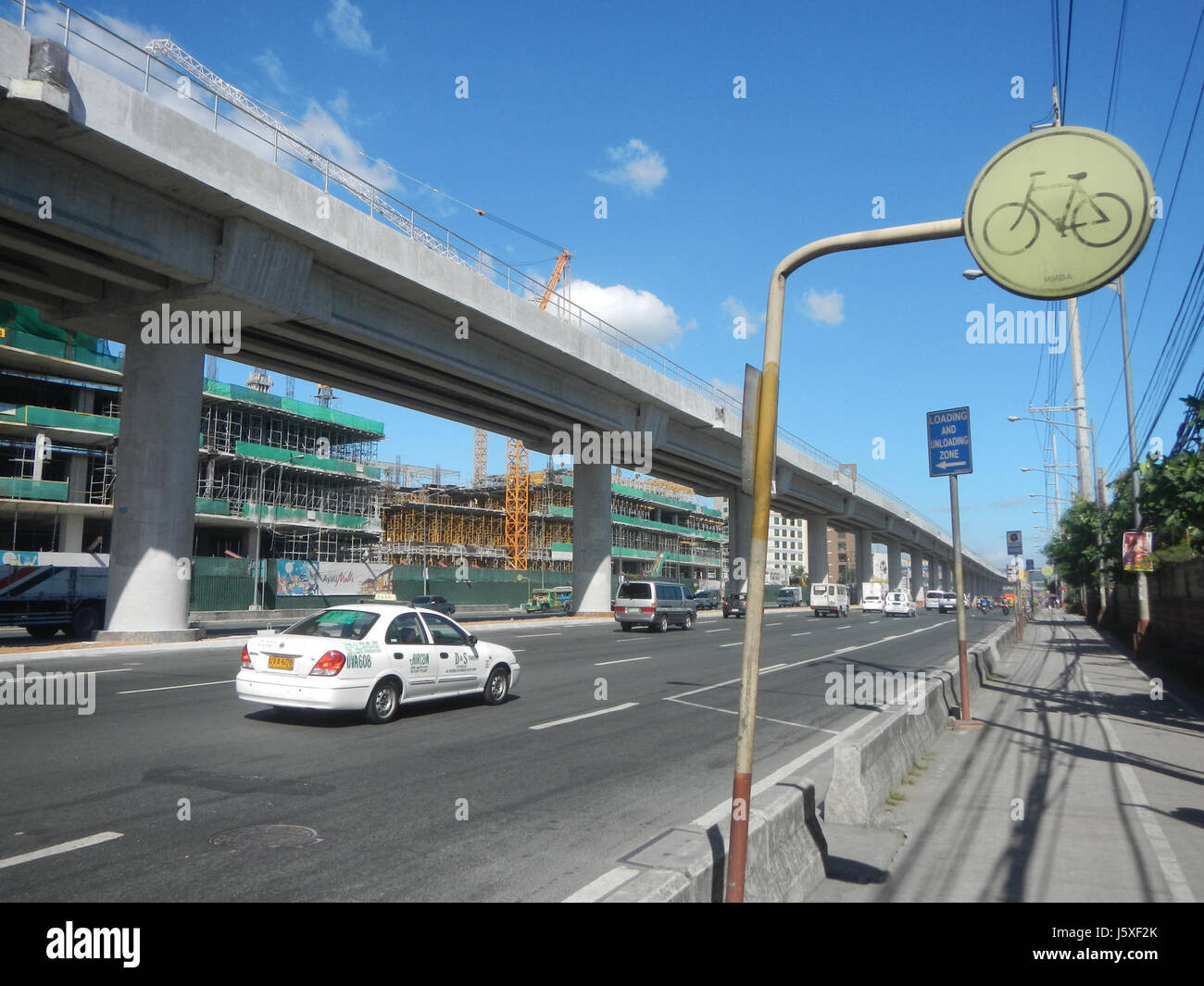 The construction of the Manila MRT Line 7, passing through areas such ...