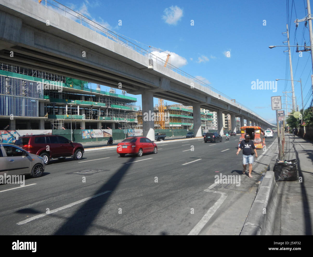 This image shows construction activity related to the Manila MRT Line ...