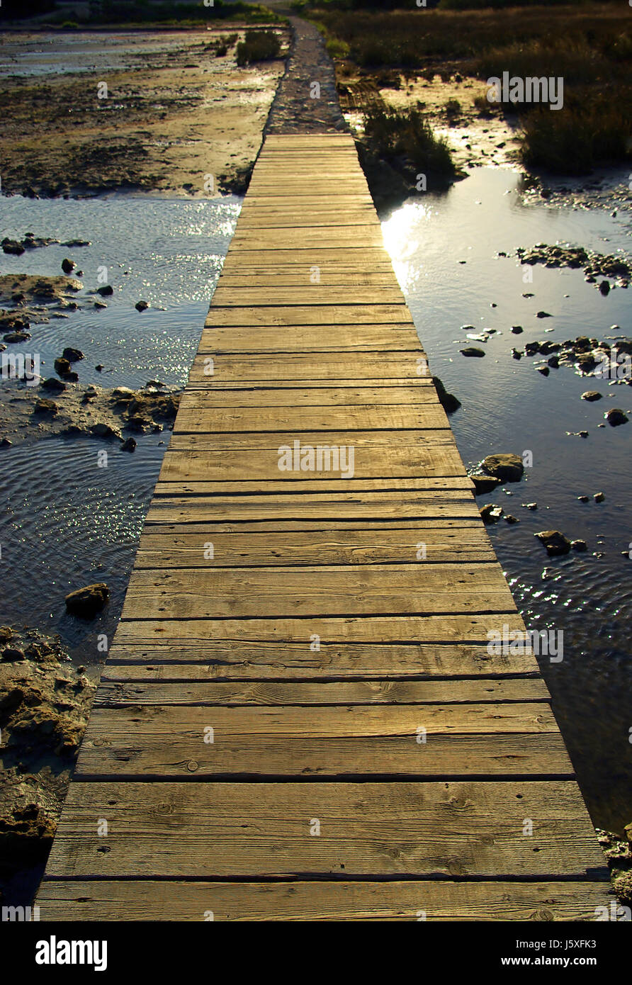 wood bridge coast path way salt water sea ocean water rowing boat ...