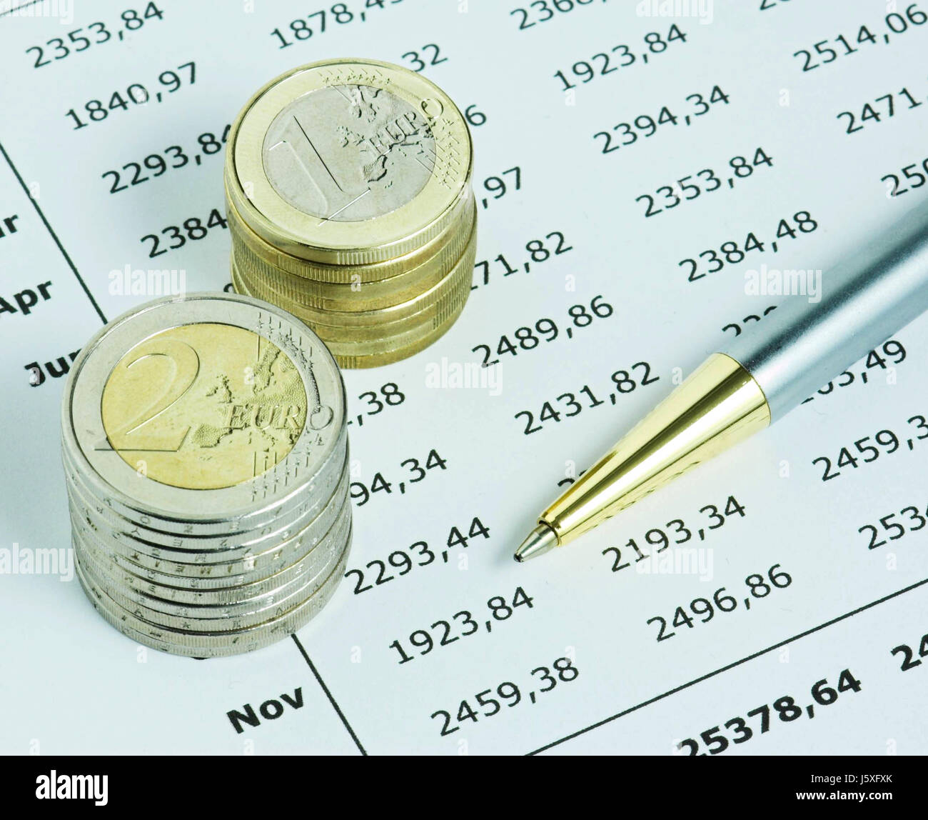 pen,coins and table ii Stock Photo - Alamy