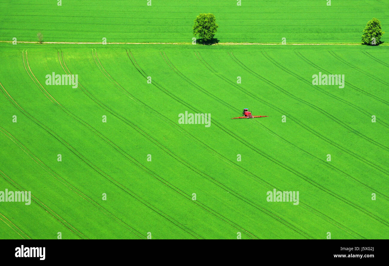 field tractor farmer scenery countryside nature aerial perspective ...
