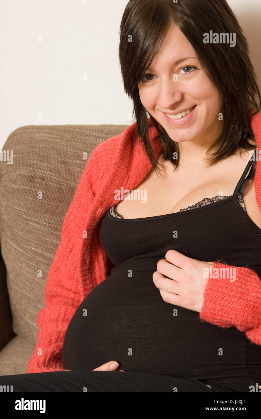 woman sofa mother mom ma mommy put sitting sit delighted unambitious ...