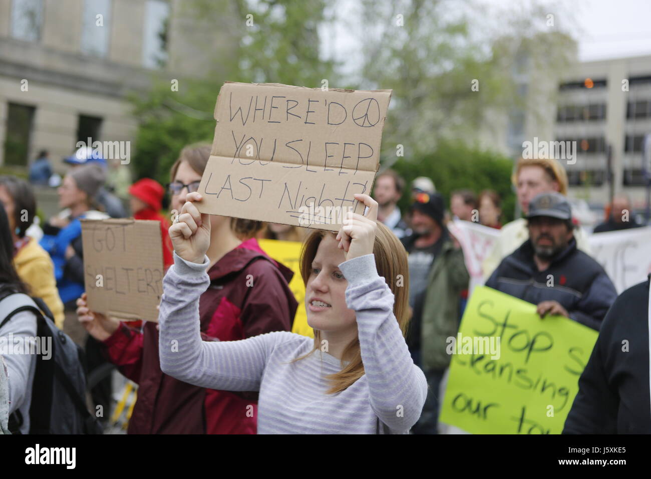 Activists march and protest for the rights of people experiencing ...