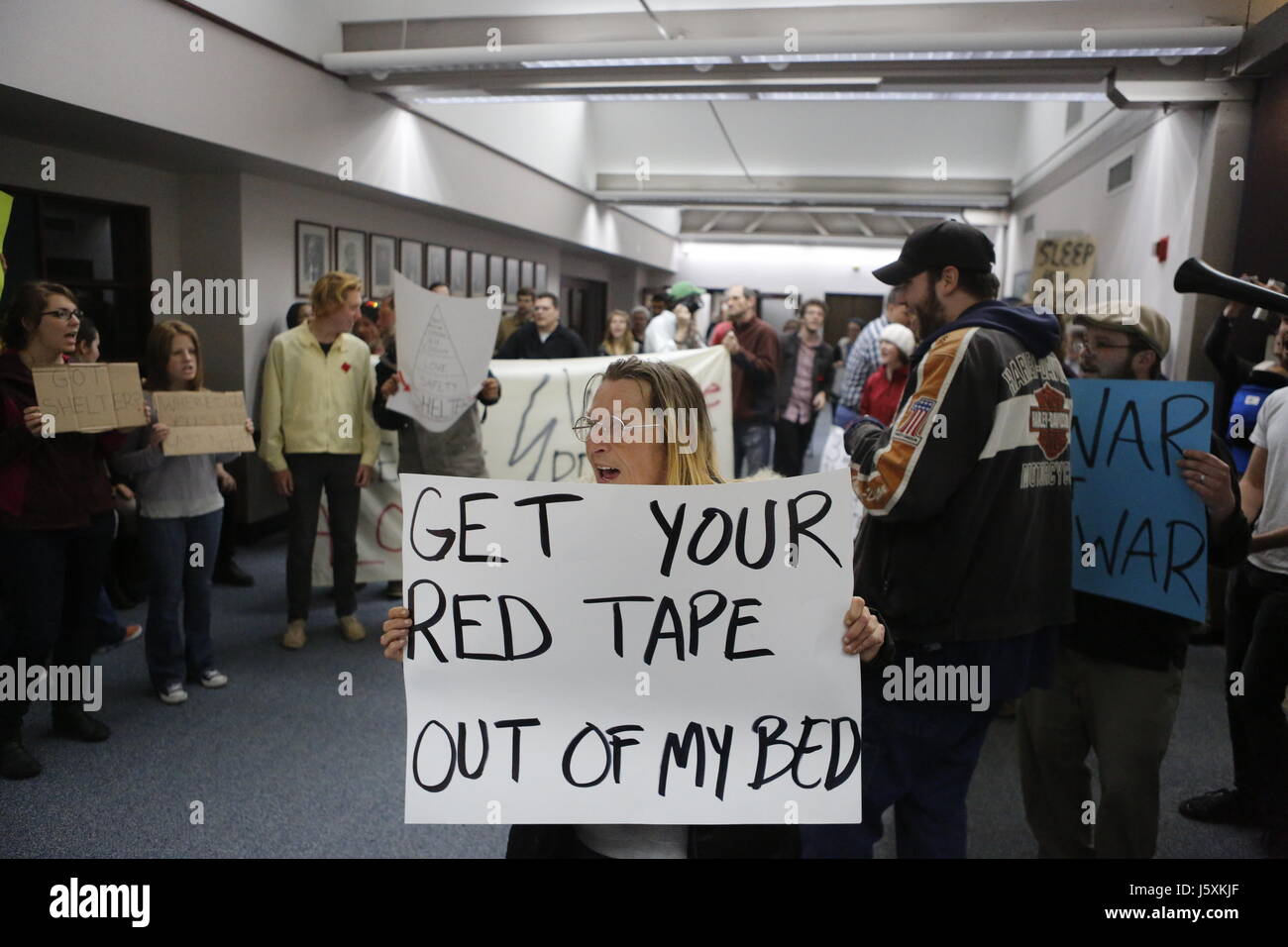 Activists march and protest for the rights of people experiencing ...