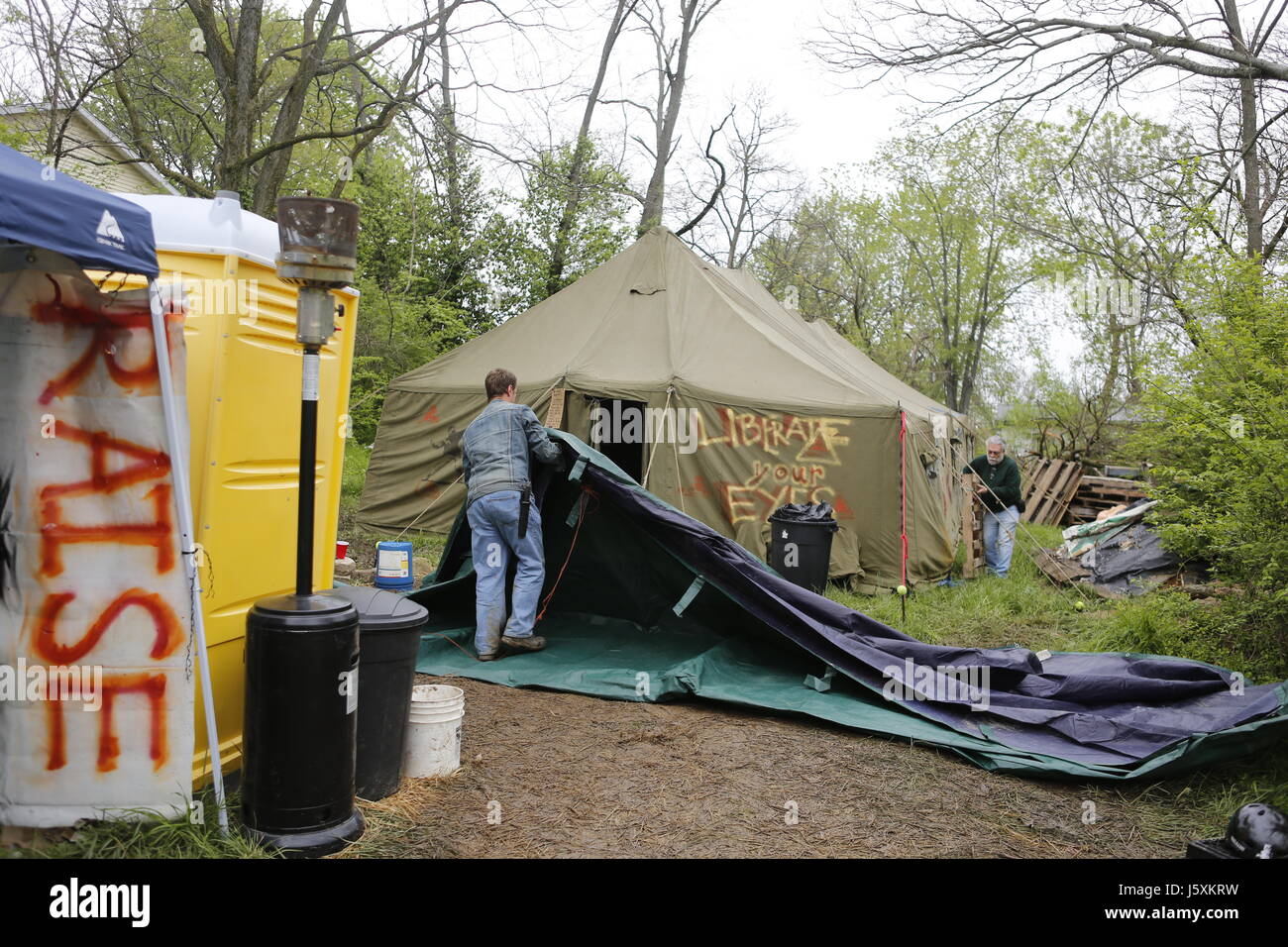 Activists march and protest for the rights of people experiencing ...