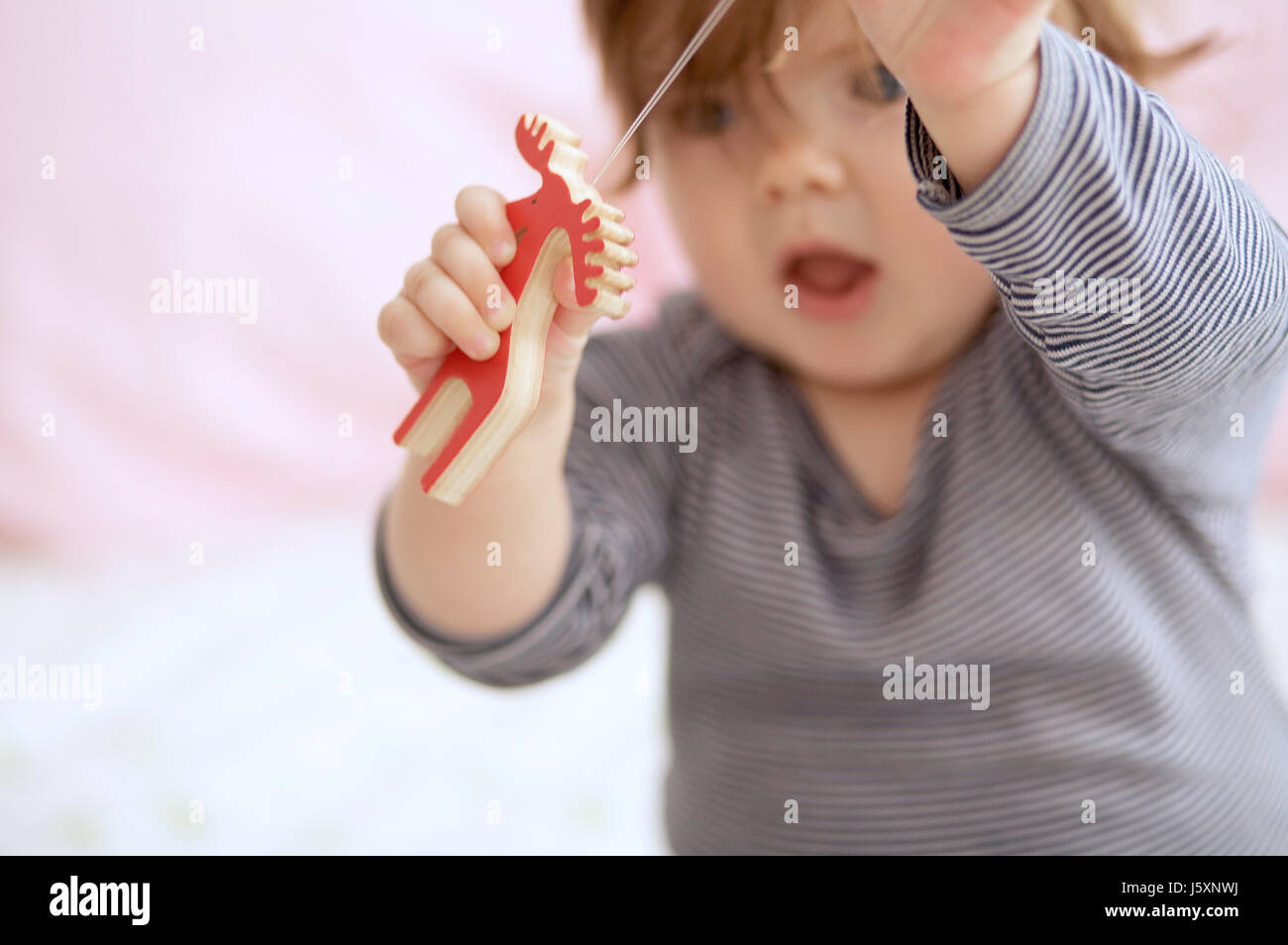 toddler playing hands Stock Photo - Alamy
