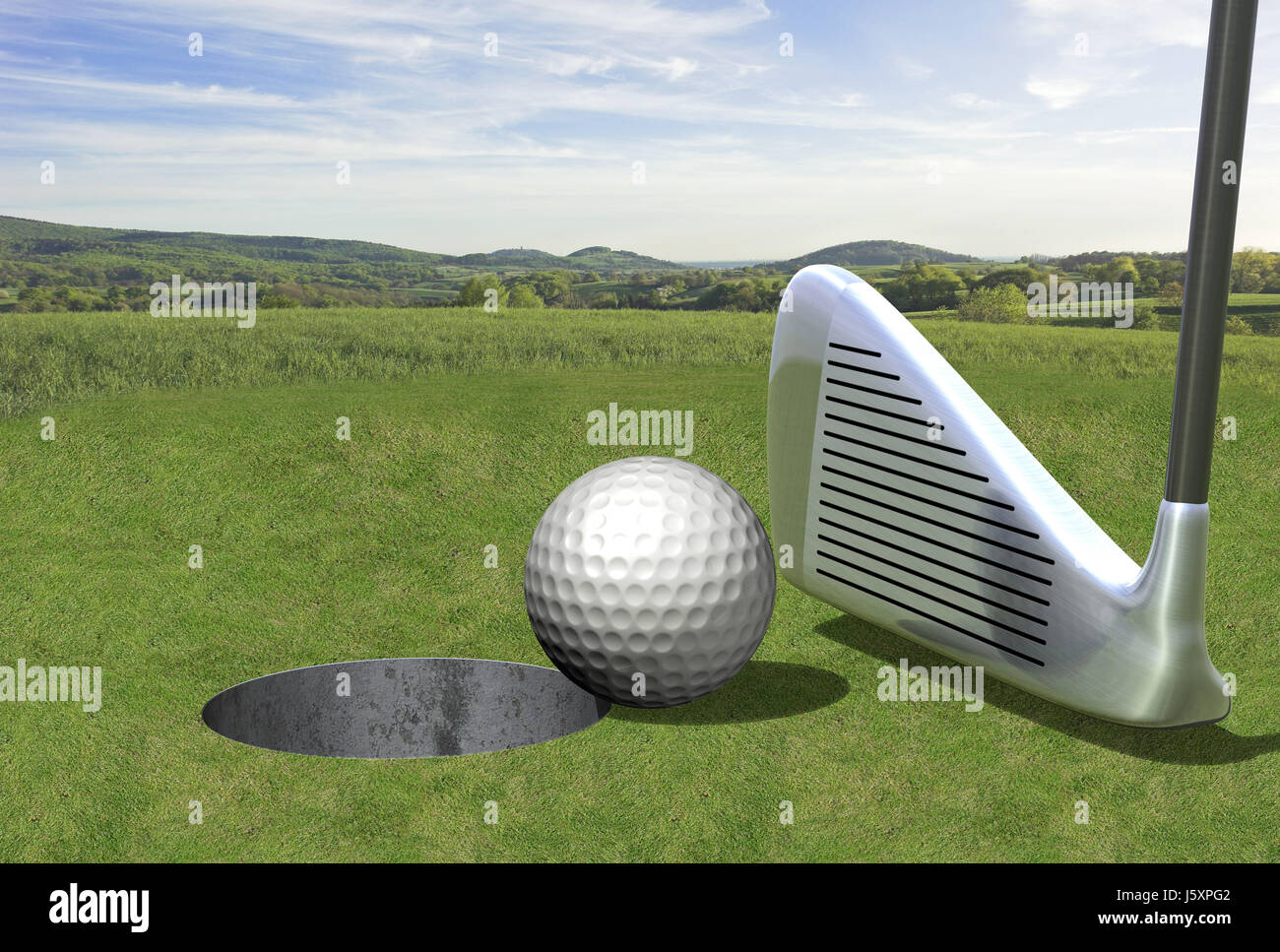 golf ball in front of hole Stock Photo - Alamy