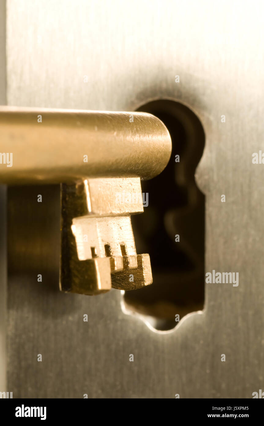 door golden open key uncap keyhole security safety lock macro close-up ...