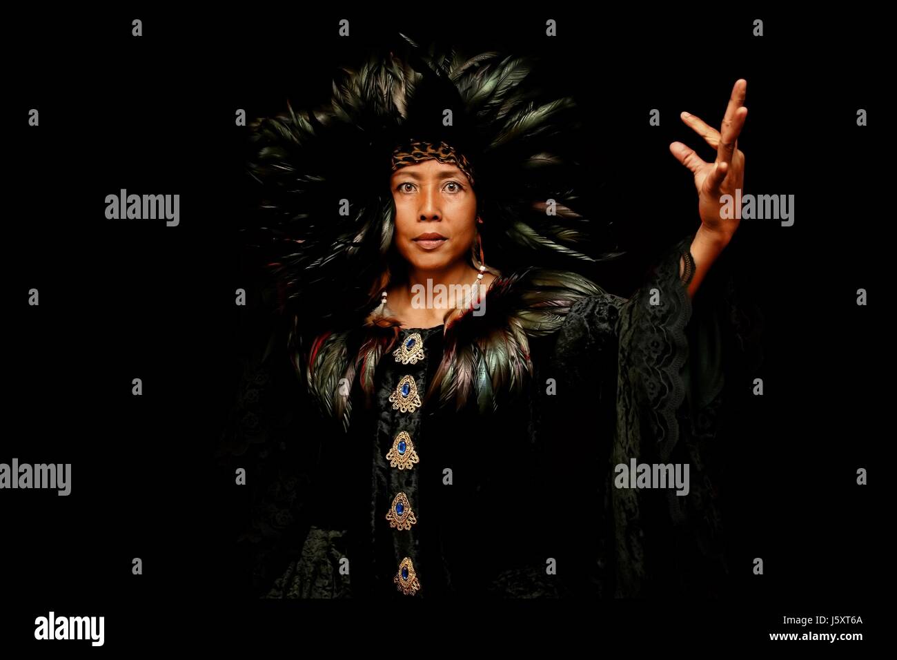 woman eyes feathers mimic art sorceress ritual pose voodoo woman eyes ...