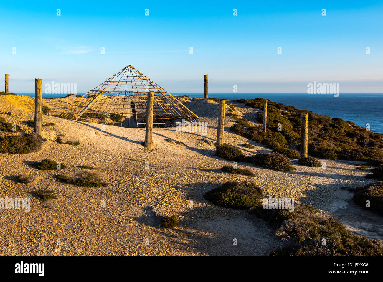 Open mineshaft near to the Cornish Coast Footpath, protected by a ...