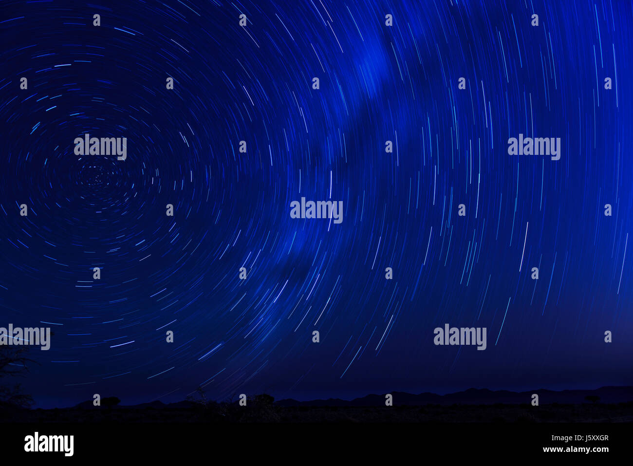 Star trails in the Namibian desert night sky Stock Photo - Alamy