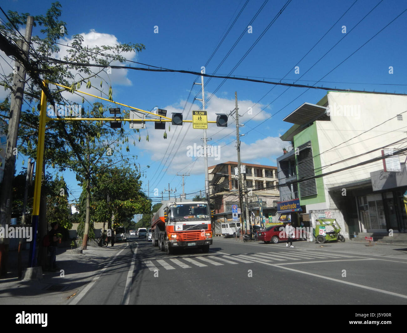 A street view of Amang Rodriguez Avenue in Rosario, Manggahan Dela Paz ...