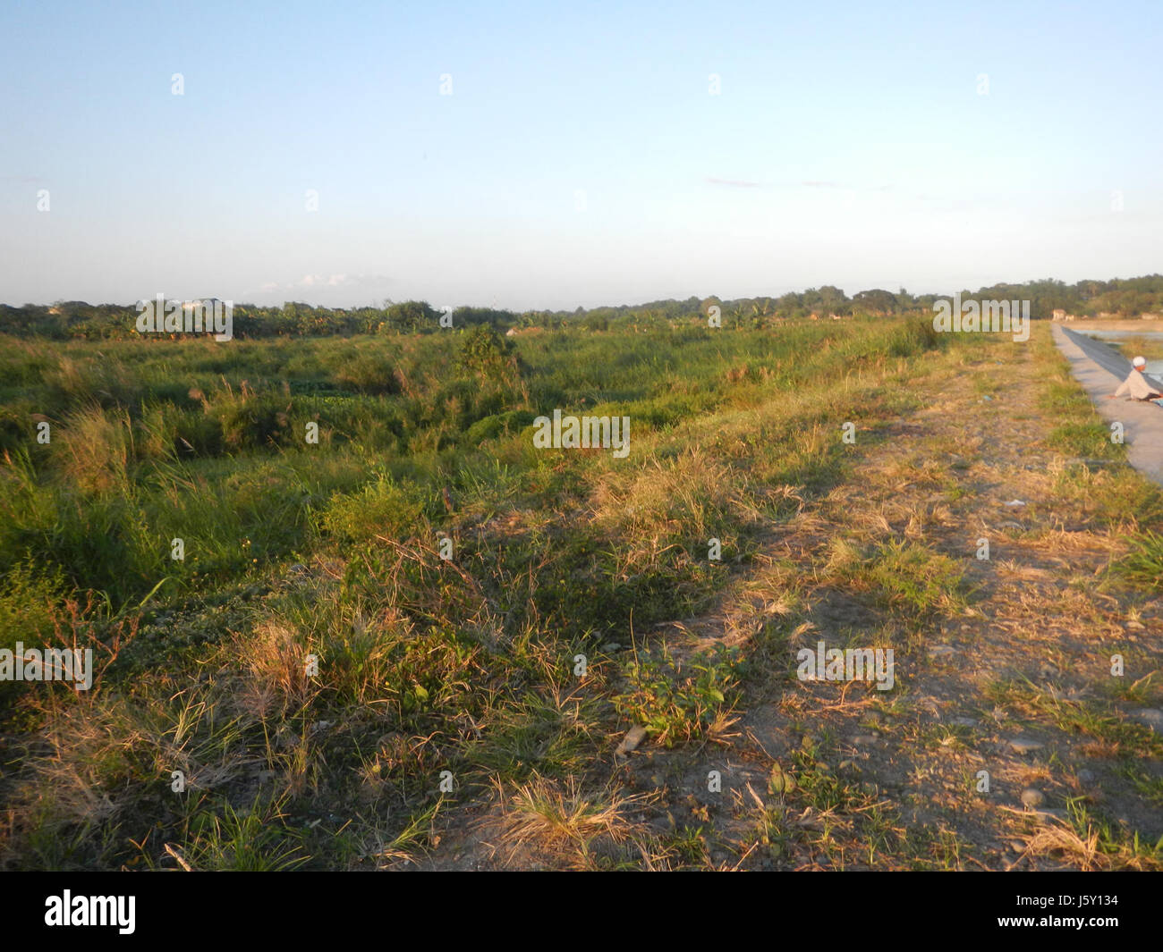 This image highlights the riprap construction and slope protection ...