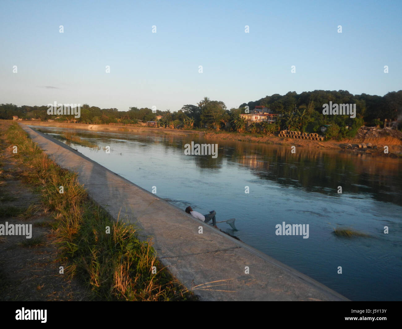 The image likely depicts a construction project on the riverbanks of ...