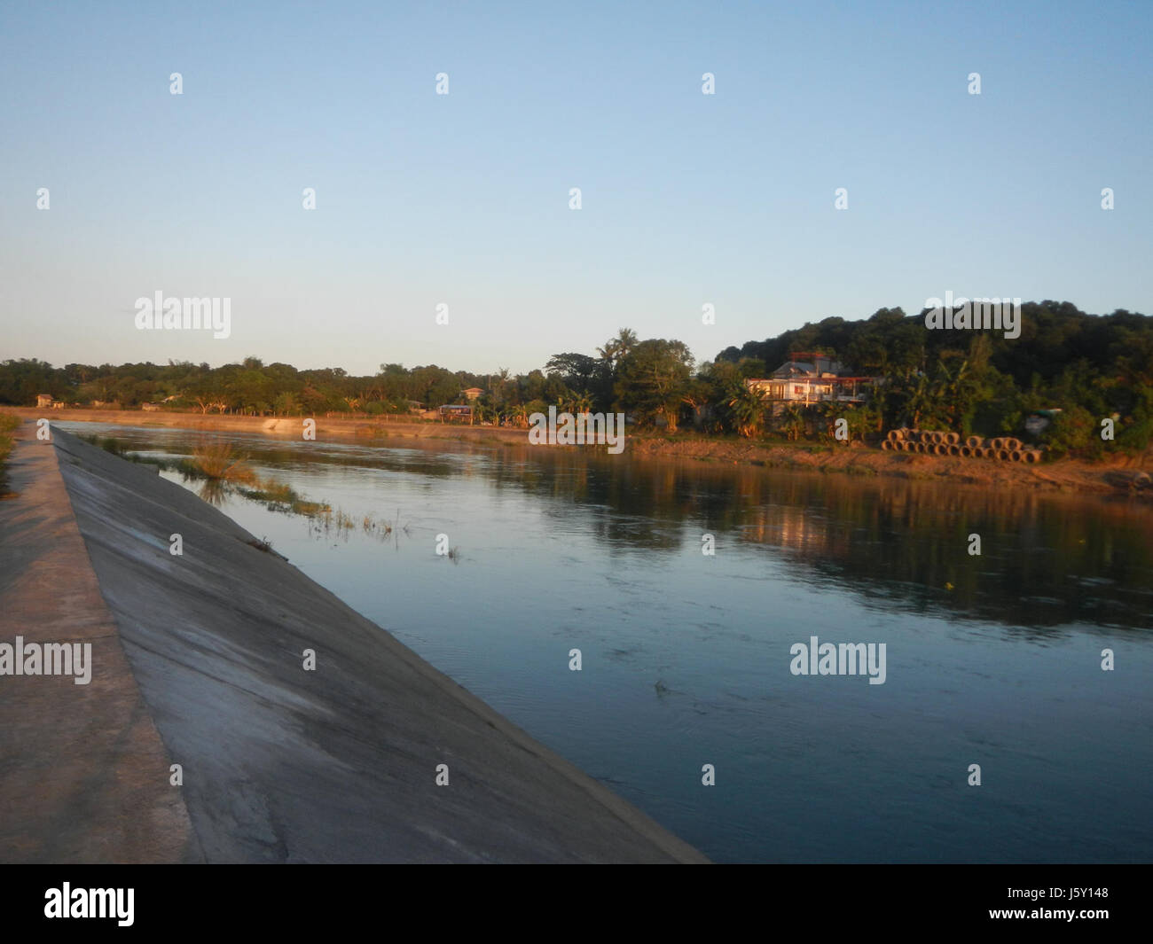 This image depicts riprap construction along the Angat Riverbanks in ...