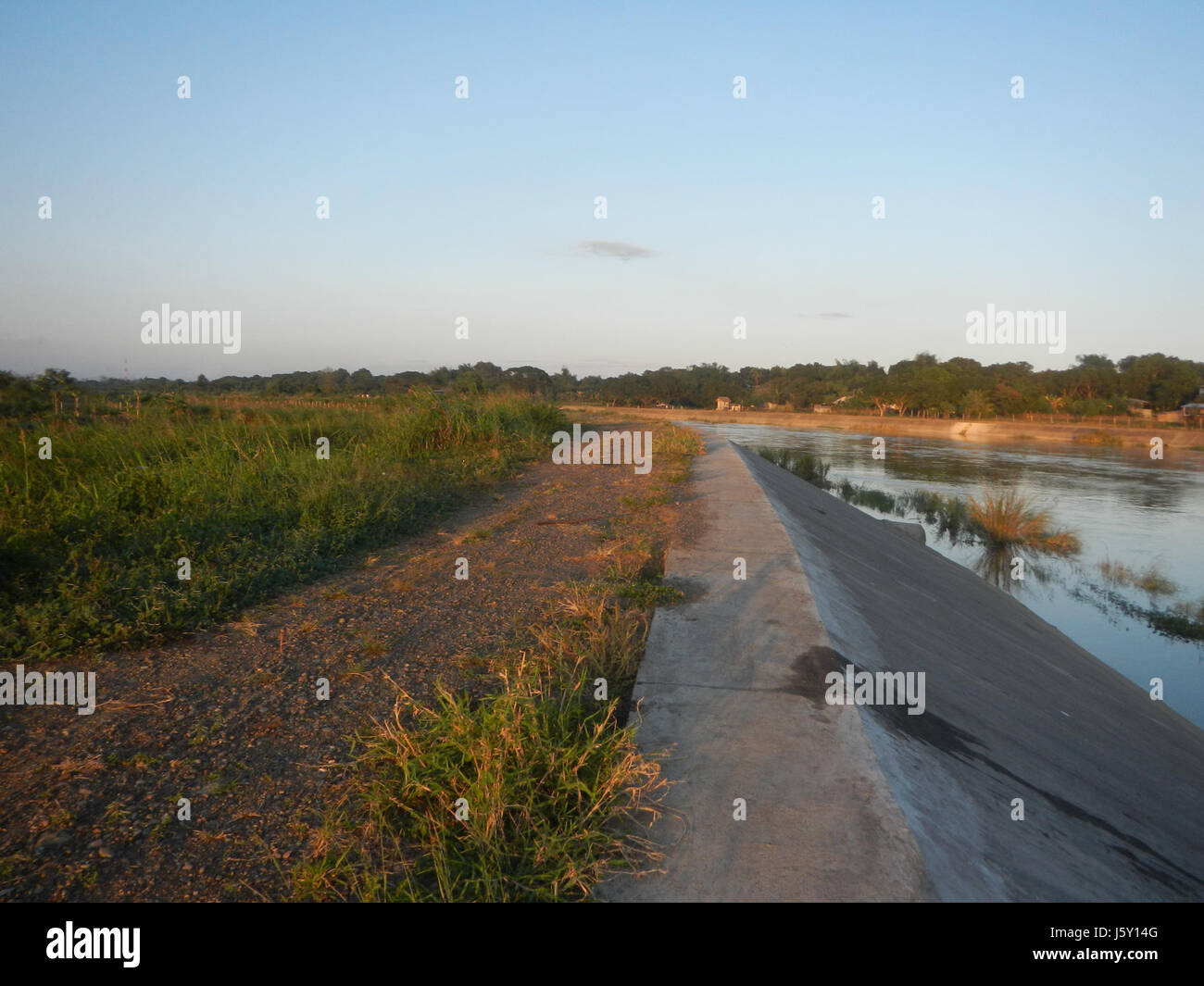 This image illustrates the construction of riprap for slope protection ...