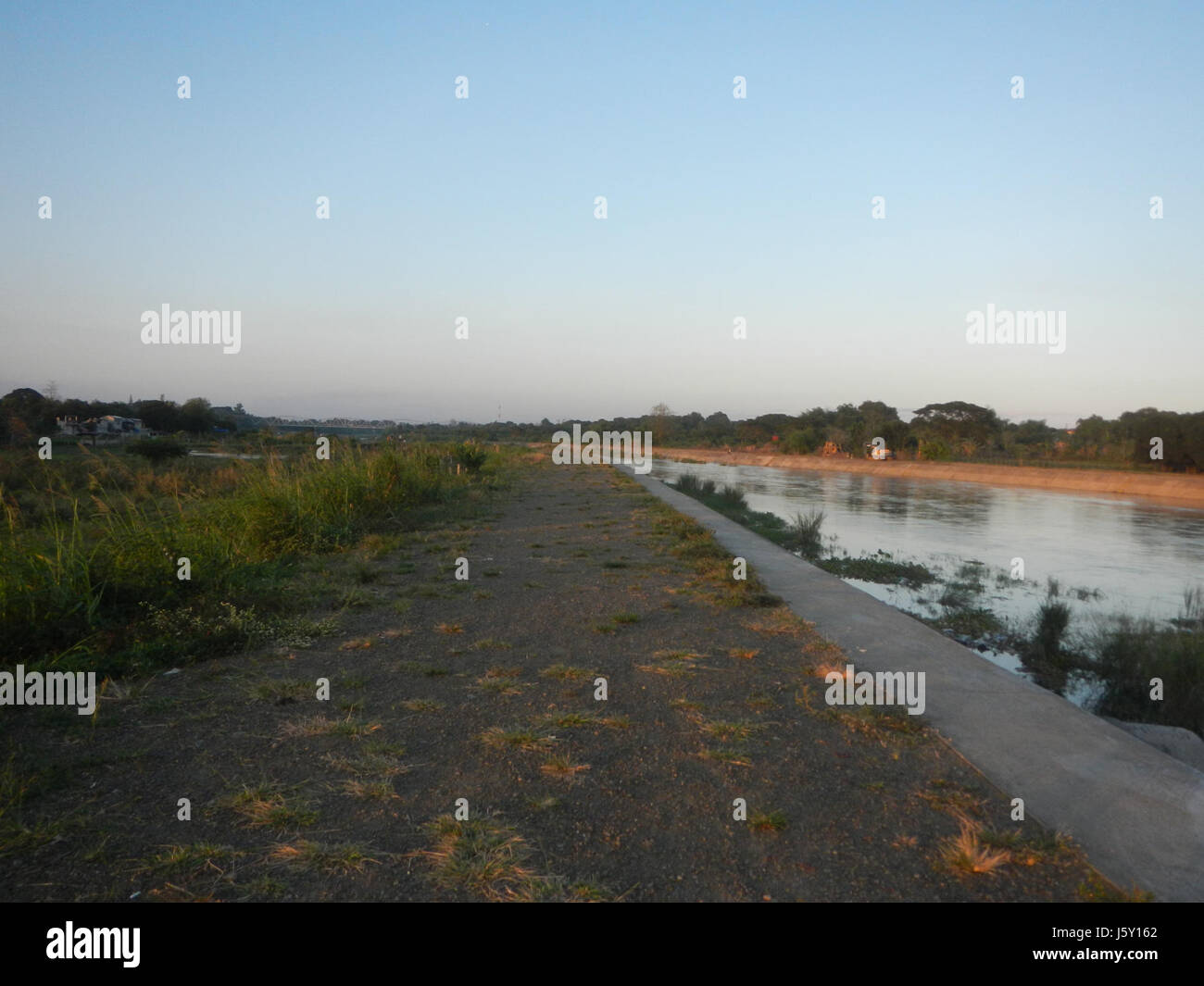 An image showing the construction of riprap slope protection along the ...