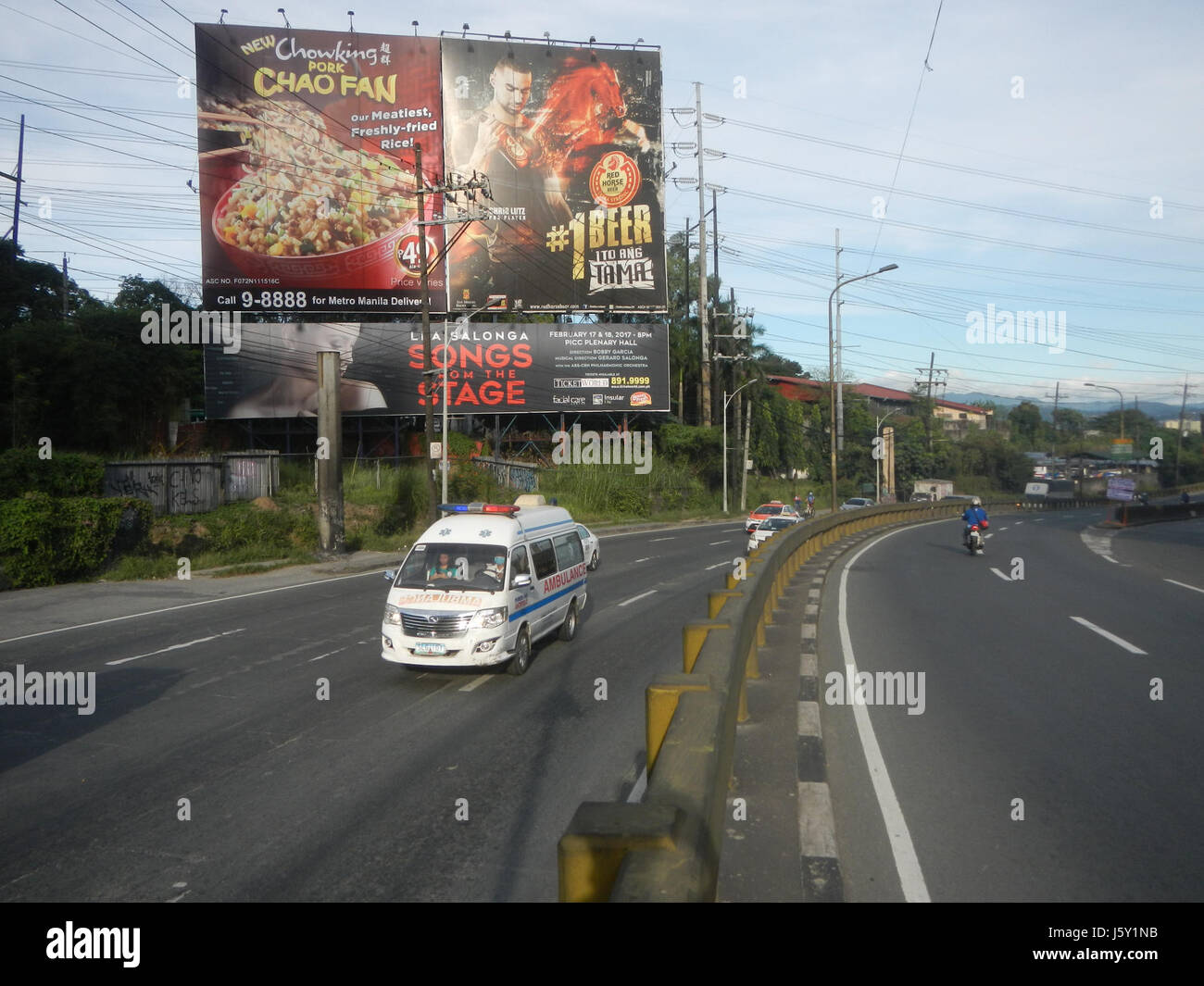 This image shows the ongoing construction of Manila's MRT Line 4, with ...