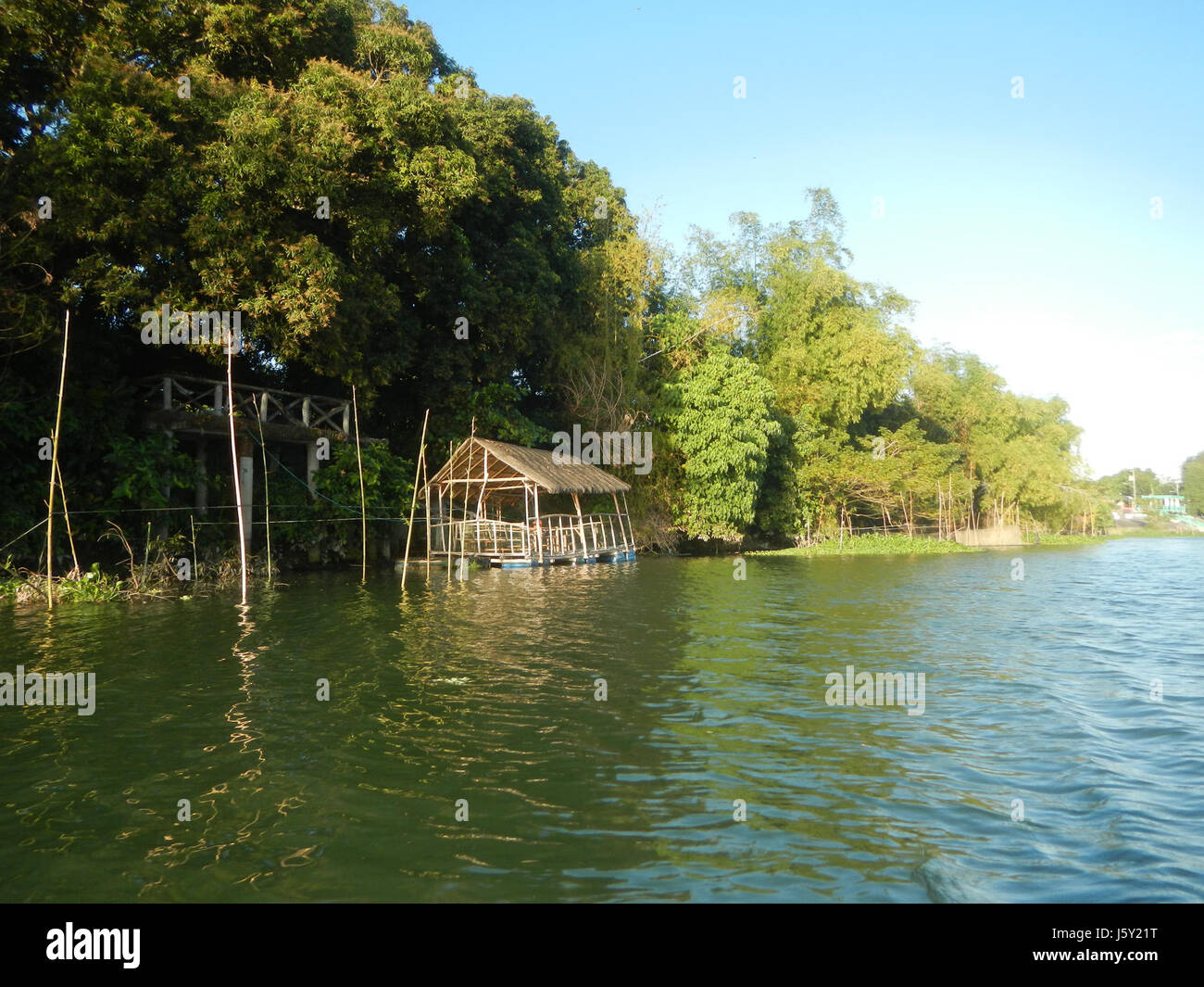 This image depicts the construction of riprap along the riverbanks in ...