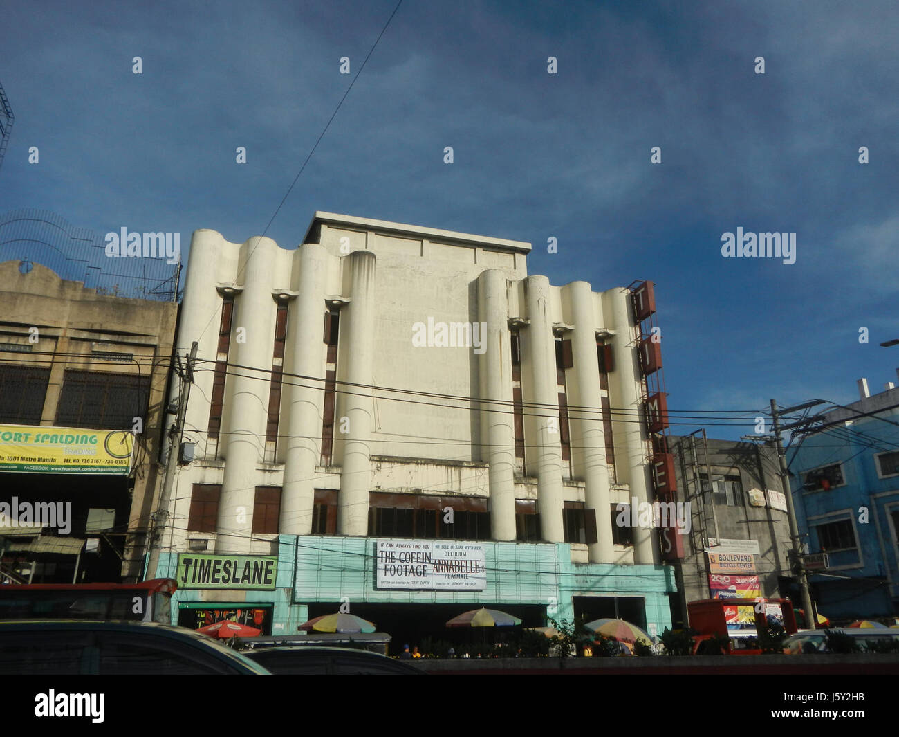 This image depicts buildings in Quiapo, Manila, a historic area known ...