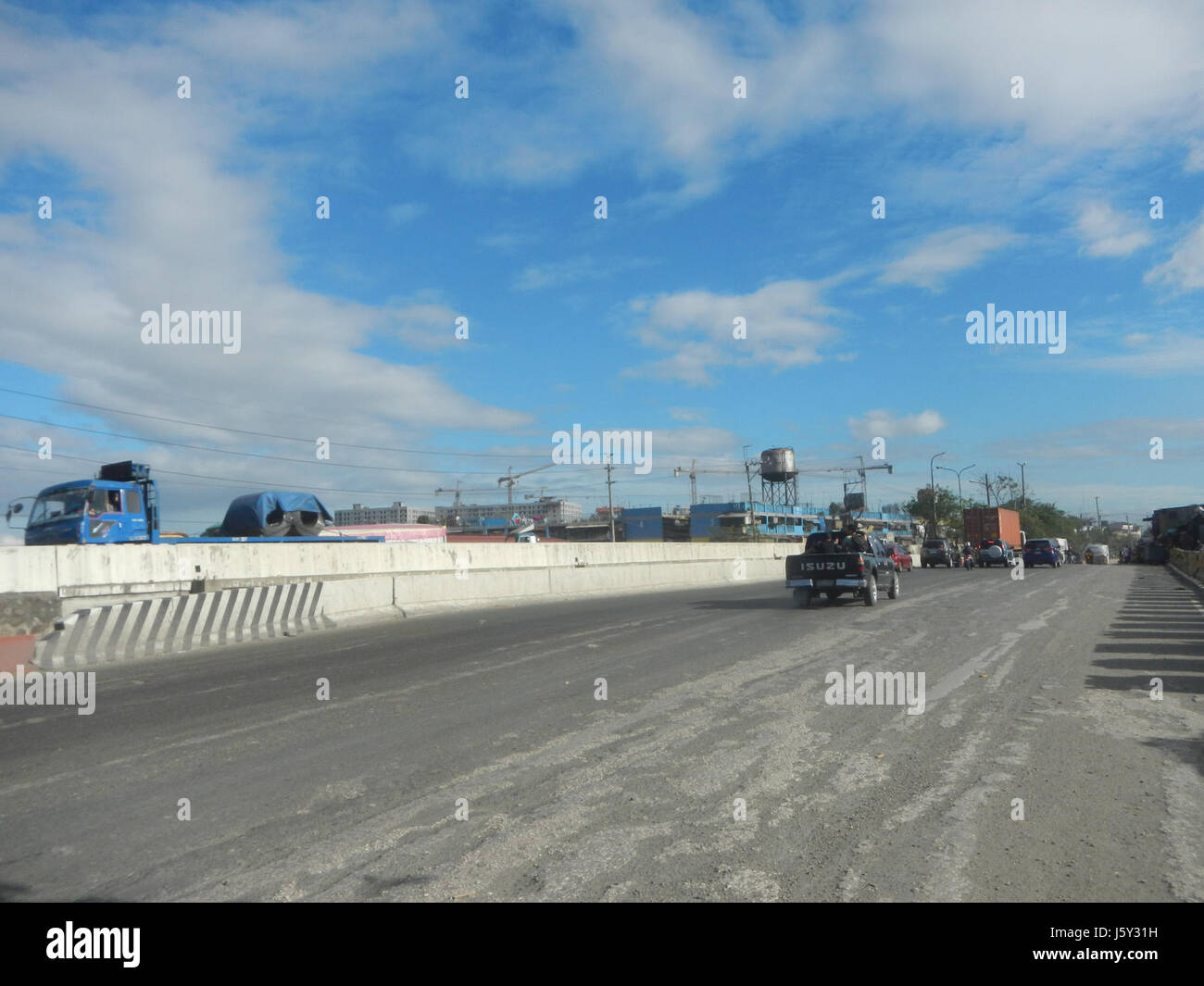 This title refers to the R-18 Bridge in Tondo, Manila, a key ...
